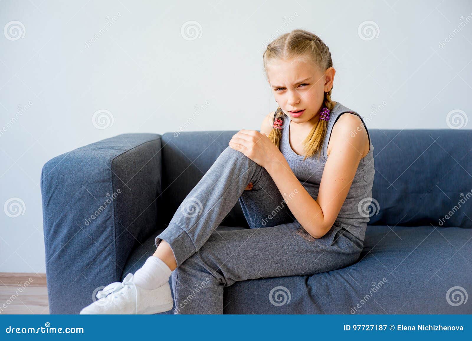 Girl sprained her leg stock image. Image of physical - 97727187