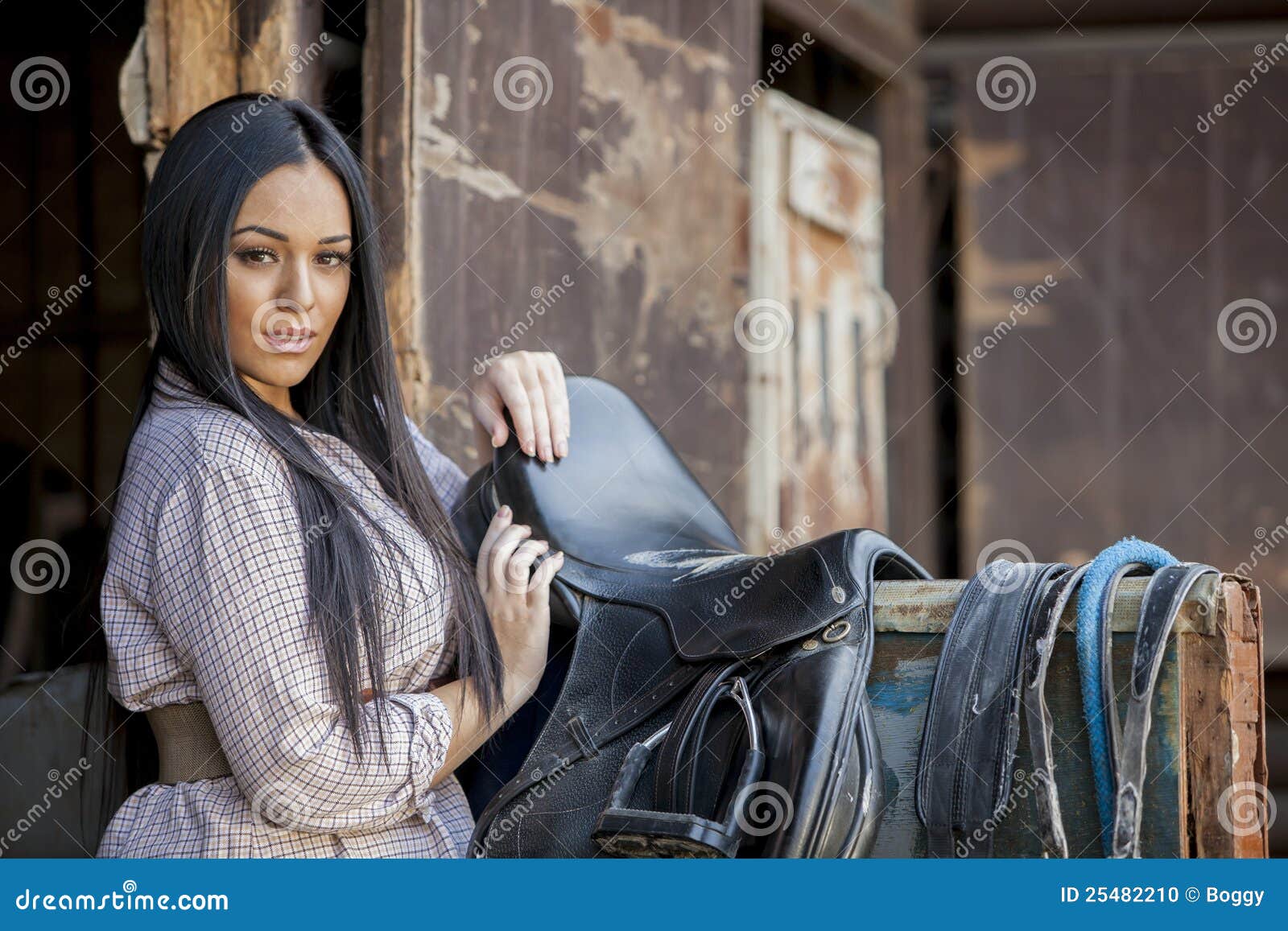 Girl in the stable stock photo. Image of saddle, portrait - 25482210