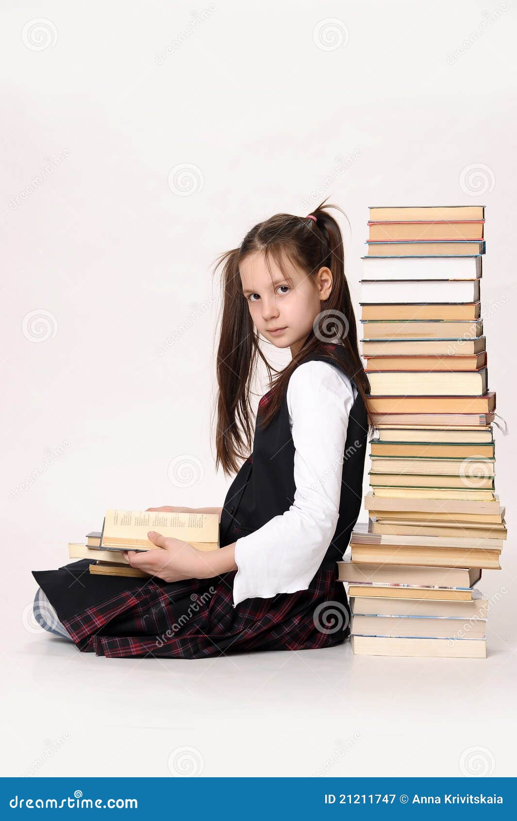 Girl with a stack of books stock image. Image of beautiful - 21211747