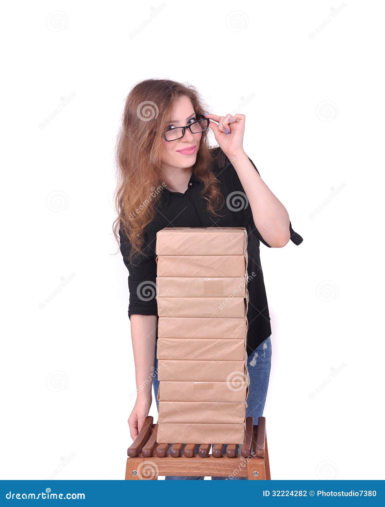 Girl with a stack of paper stock photo. Image of paper - 32224282