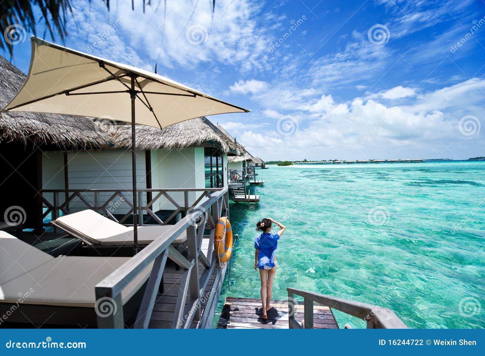 Girl Standing on Deck of the Over-water Ho Stock Photo - Image of ...