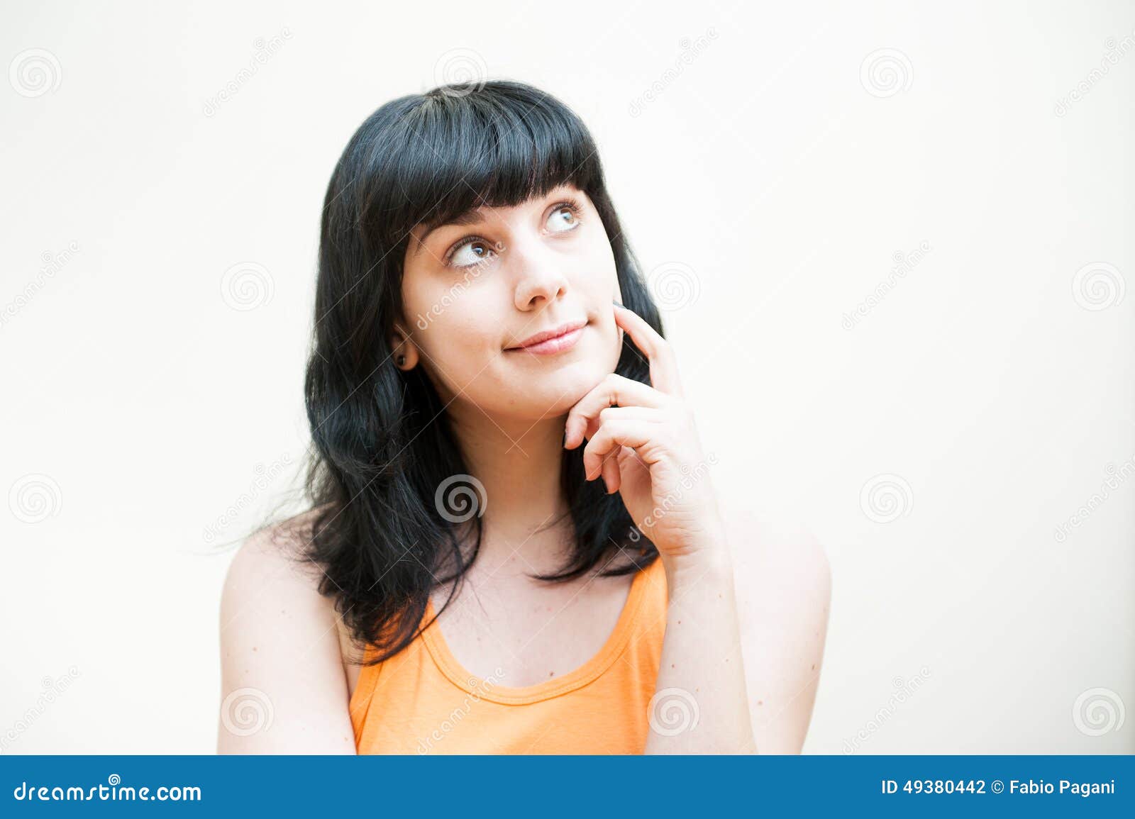 Girl Standing Looking Up Thinking and Dreaming on White Background ...