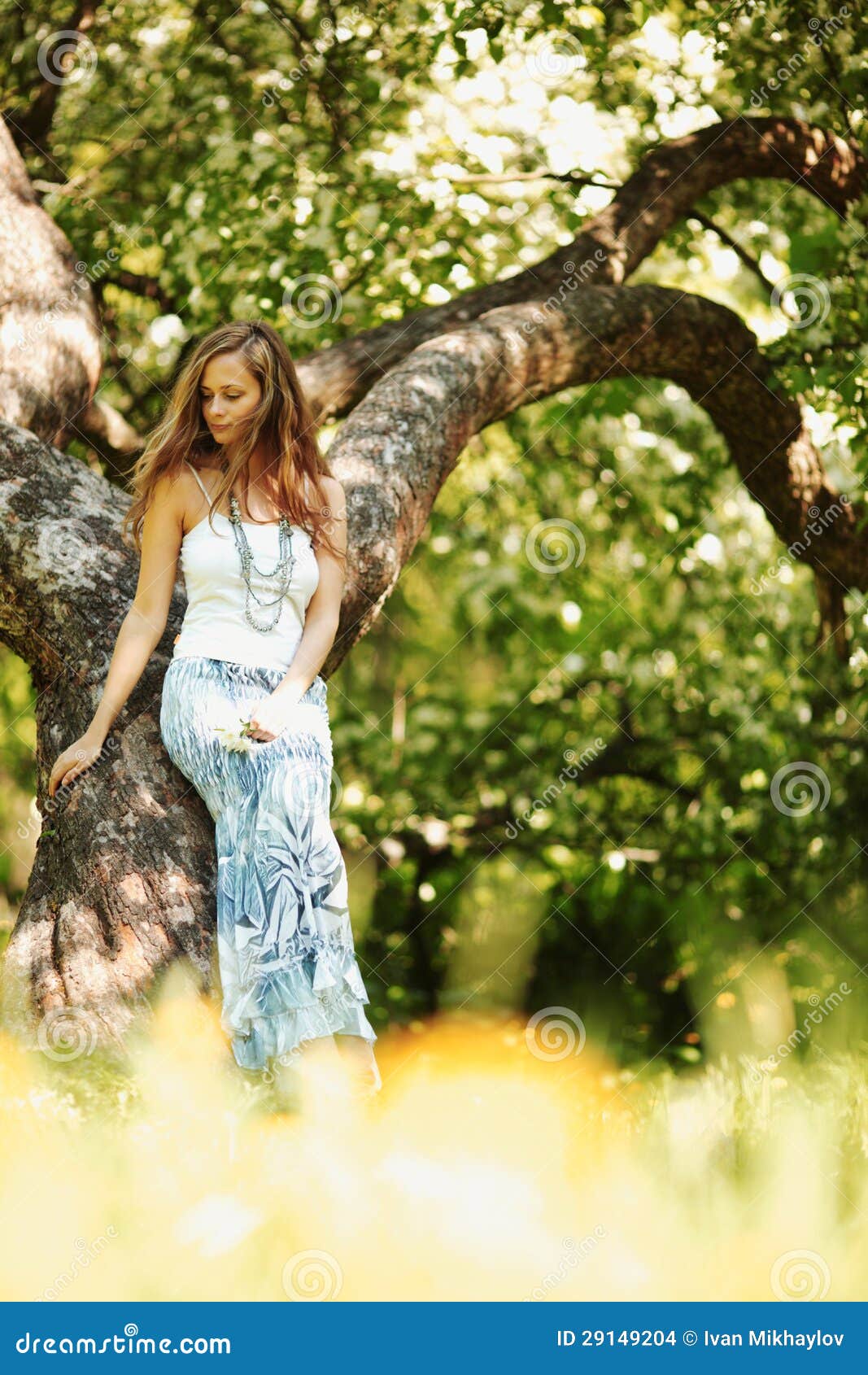 Girl Standing Next To a Tree Stock Photo - Image of adult, looking ...
