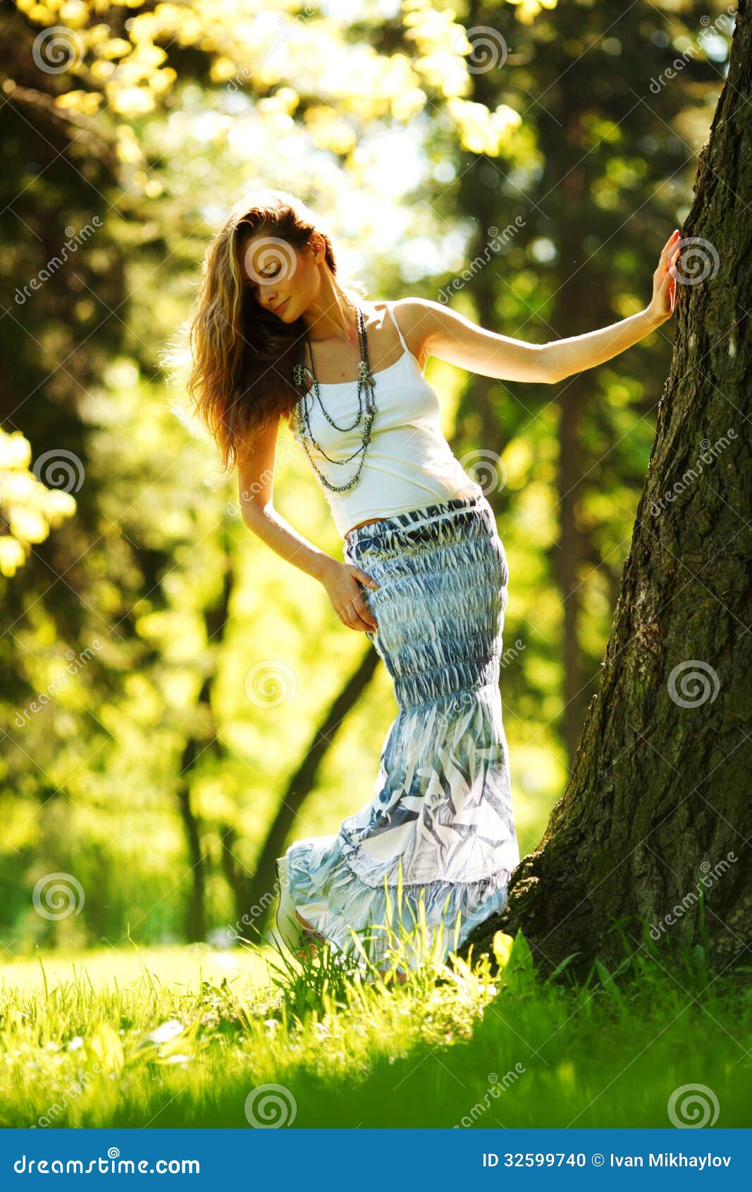 Girl Standing Next To a Tree Stock Photo - Image of dream, life: 32599740