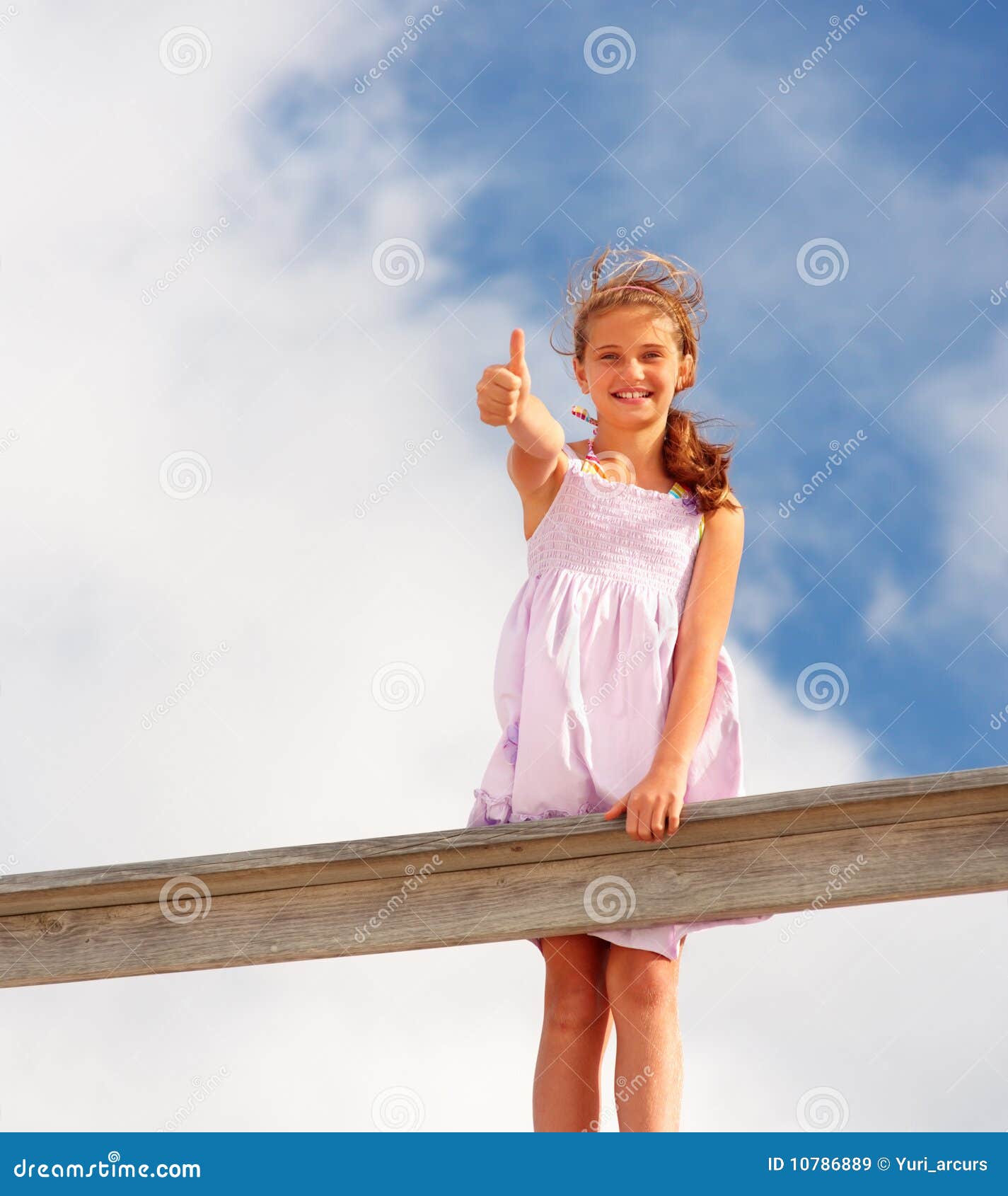 Girl Standing on a Railing Showing a Thumbs Up Stock Image - Image of ...