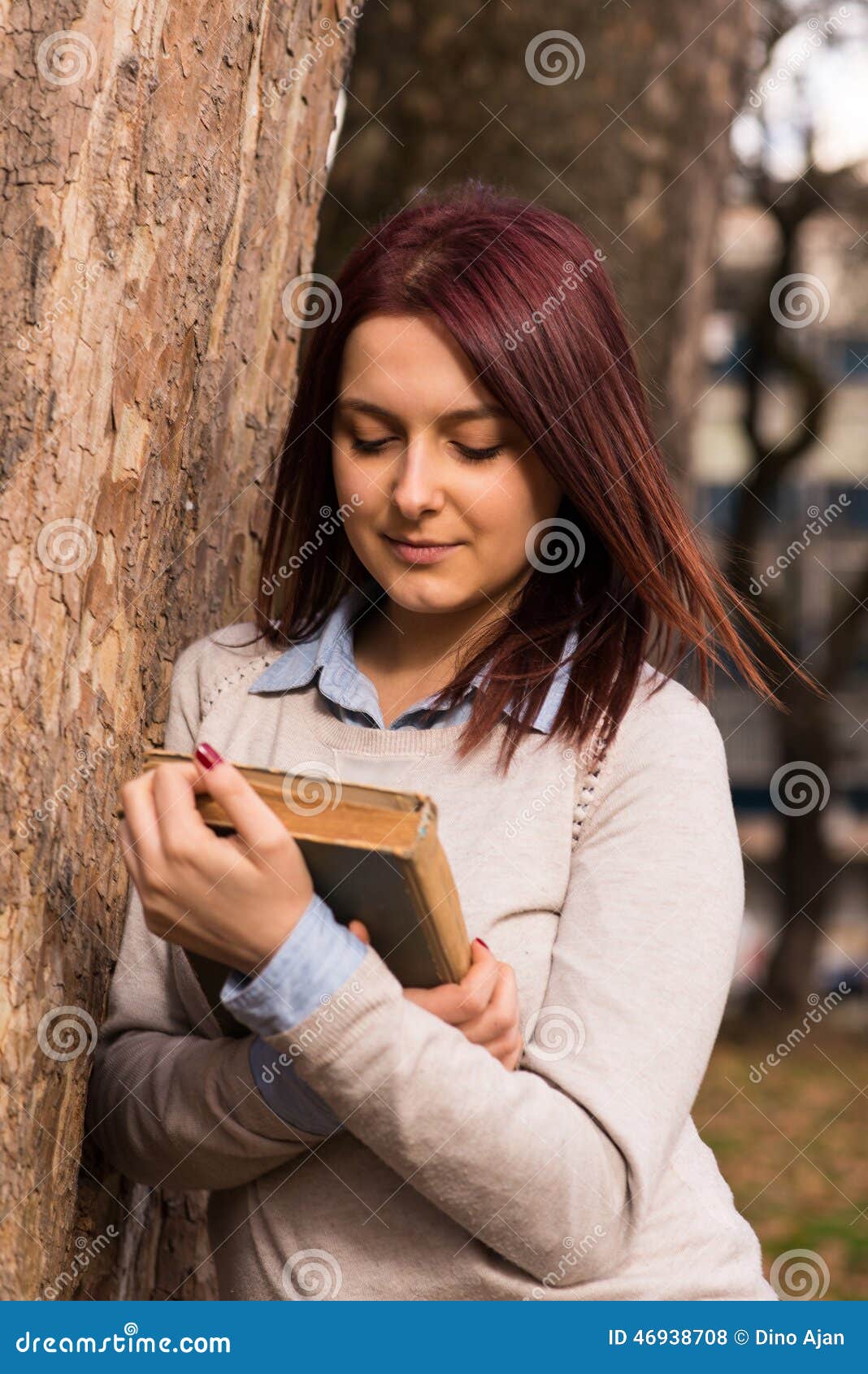 Girl Standing and Reading a Book Stock Photo - Image of beautiful, park ...