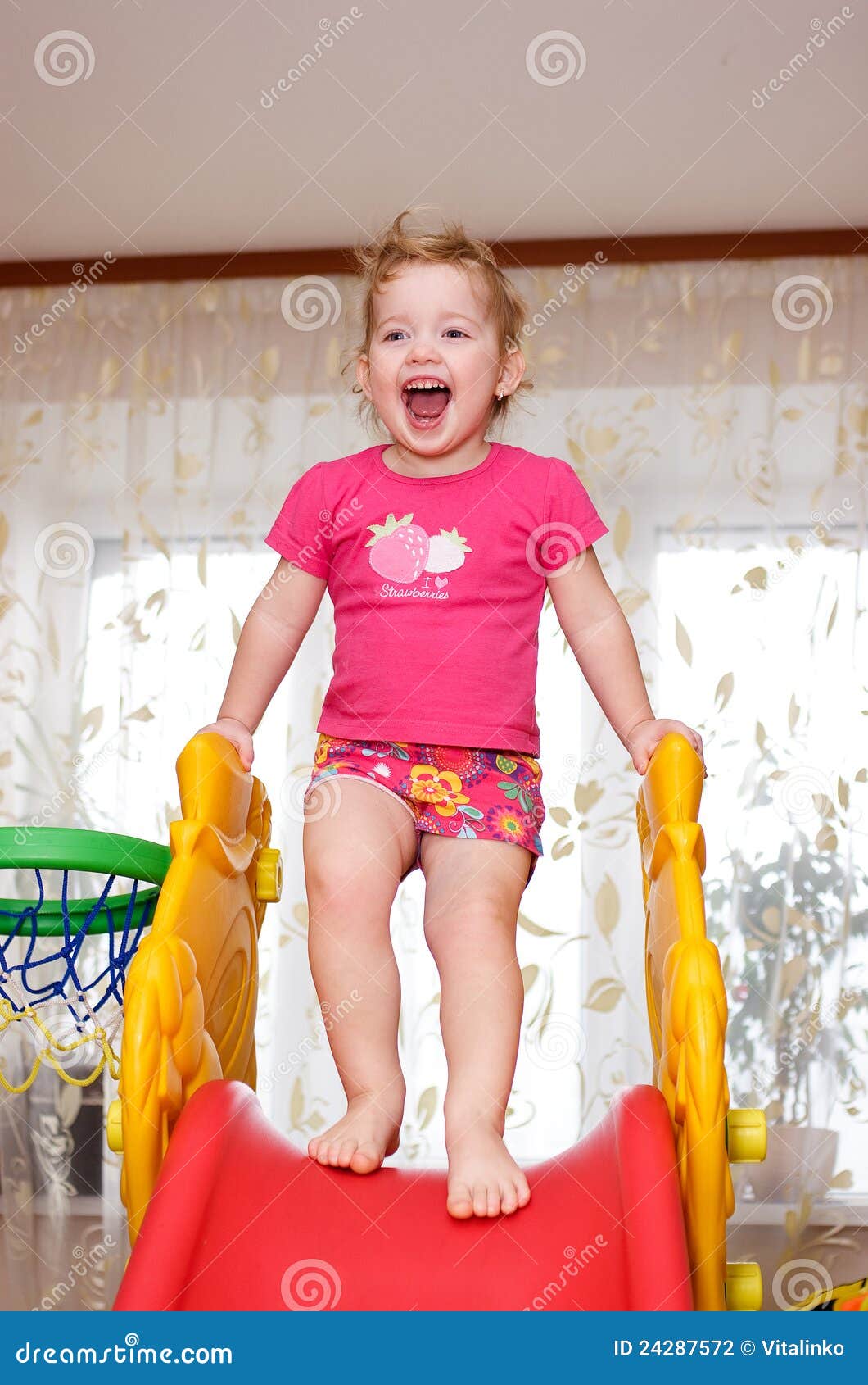 Girl standing on the slide stock photo. Image of caucasian - 24287572