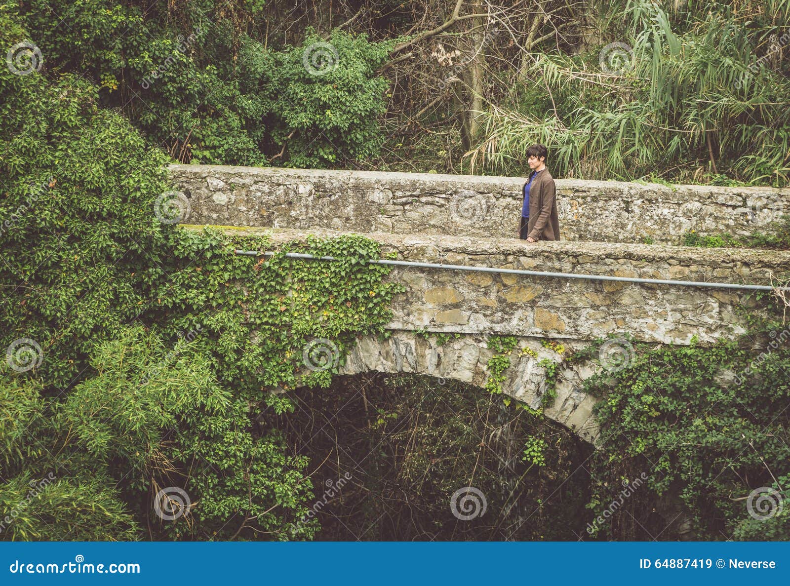 Girl Standing on a Stone Bridge Stock Image - Image of grass, urban ...