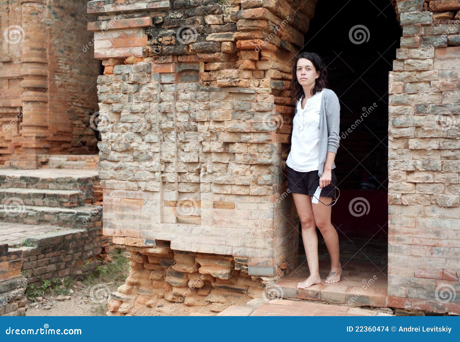 Girl standing in temple stock photo. Image of indigenous - 22360474