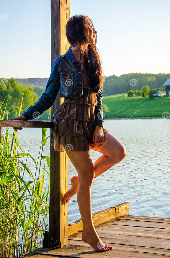 Girl Standing On A Wooden Pier Stock Image Image Of Rays Short