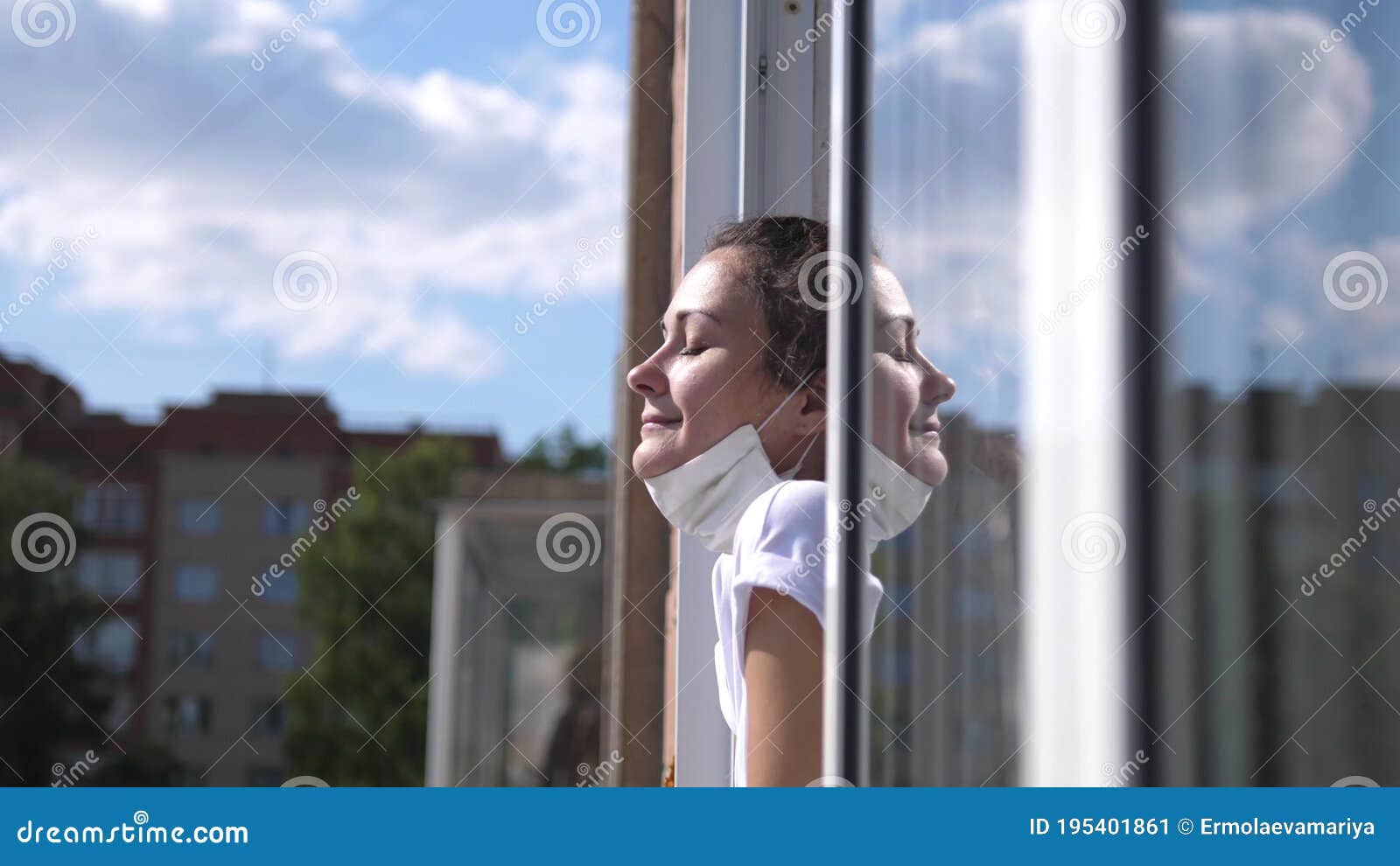 Girl Stands On The Balcony Takes Off The Mask And Breathes Stock Video