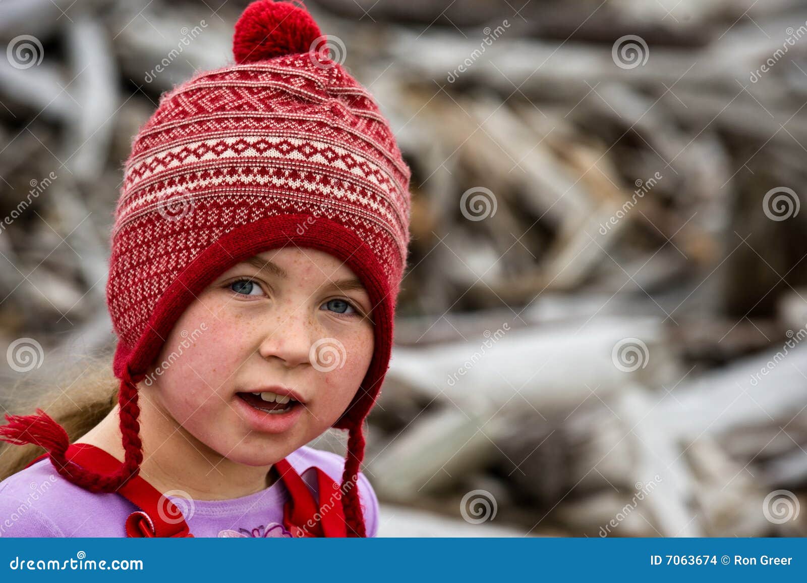 Girl in Stocking Cap Beach Combing Stock Photo - Image of youth, child ...