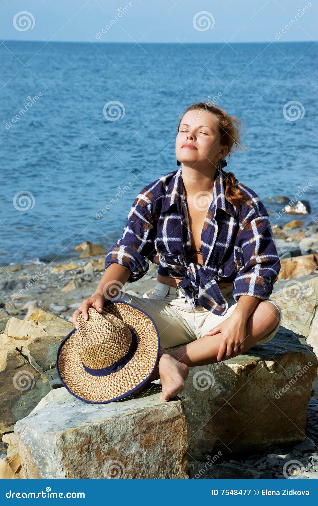 Girl on a Stone Beach with a Hat in a Hand Stock Image - Image of coast ...