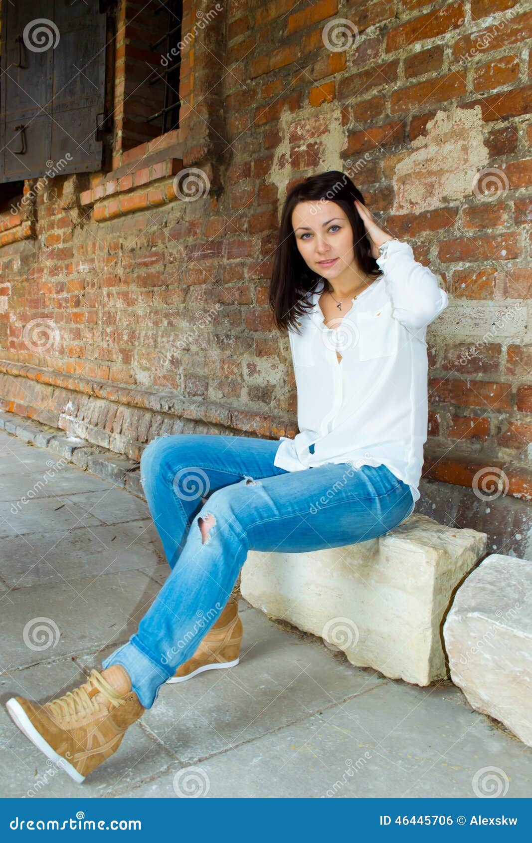 Girl on a stone stock photo. Image of face, building - 46445706