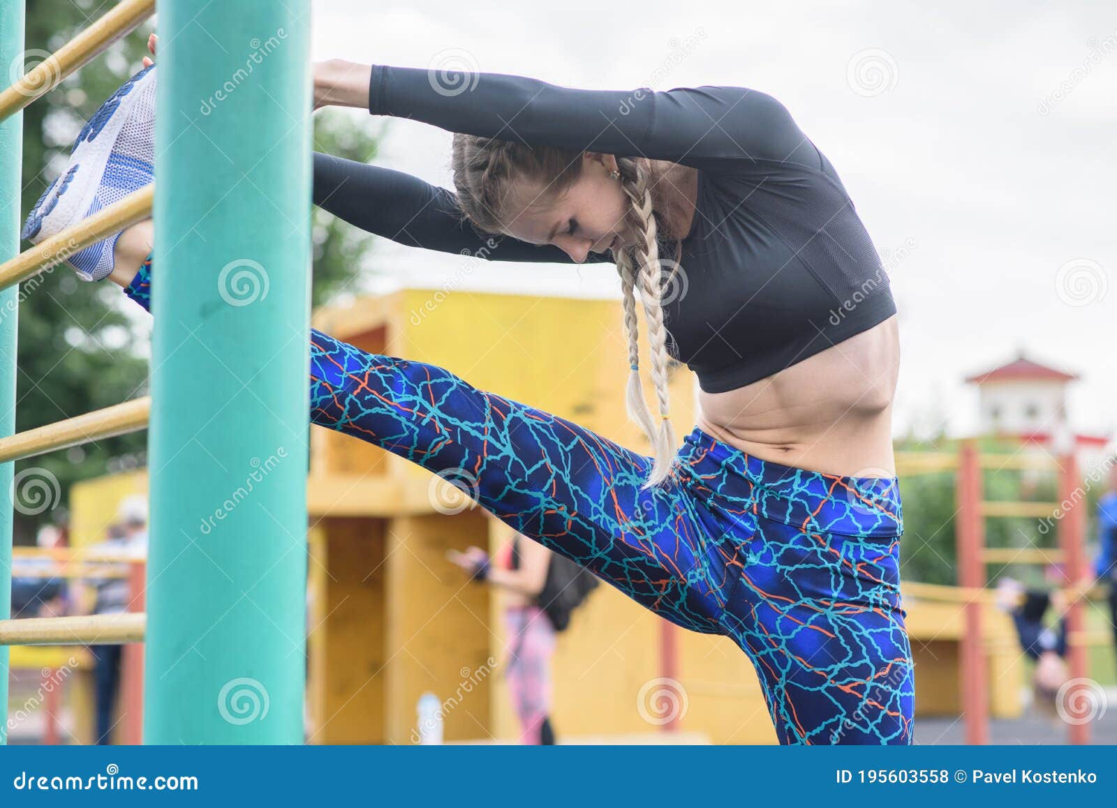Girl Stretches on the Playground. Stock Photo - Image of adult, jogging ...