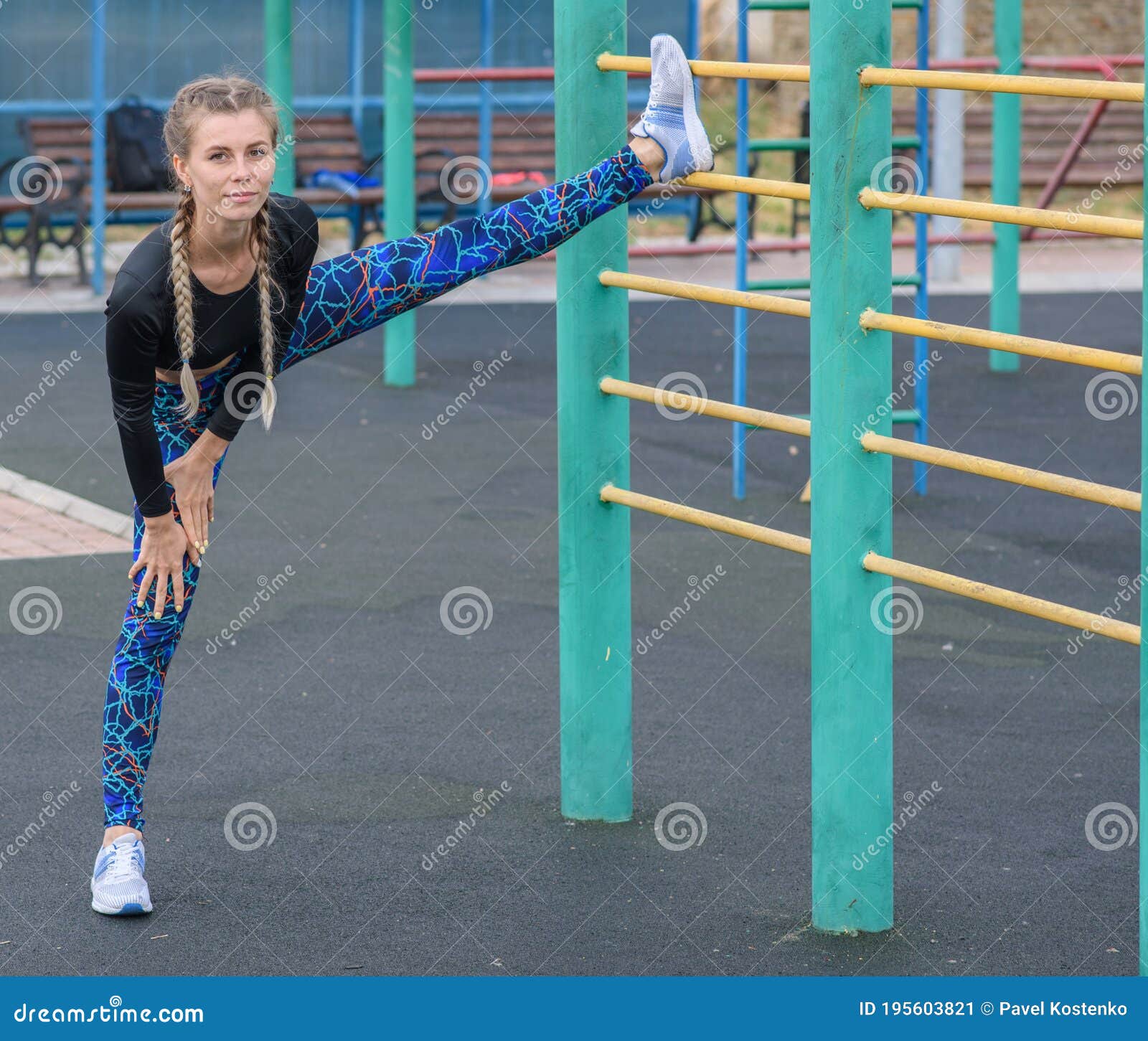Girl Stretches on the Playground. Stock Image - Image of motivation ...