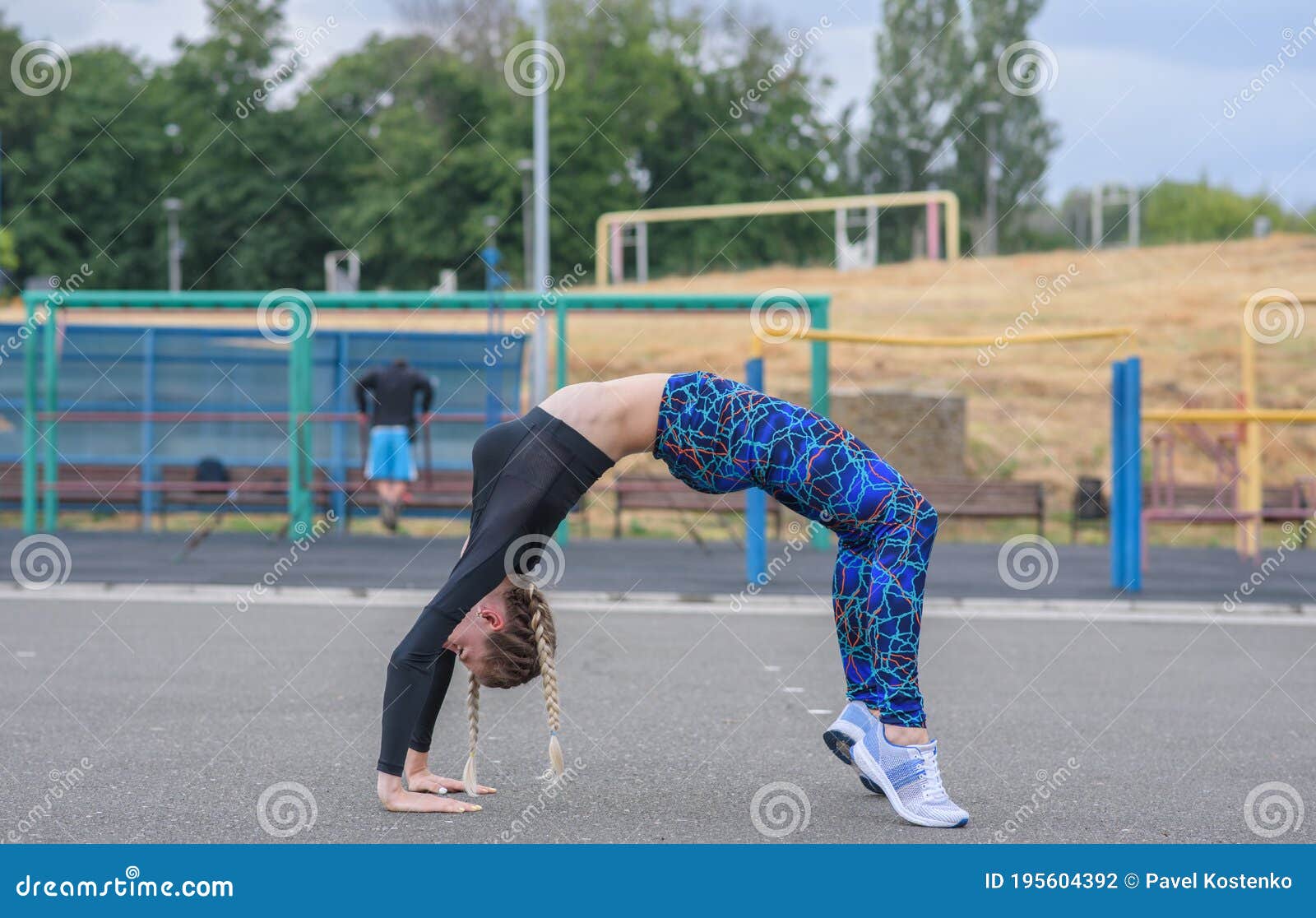 Girl Stretches on the Playground. Stock Photo - Image of body, health ...