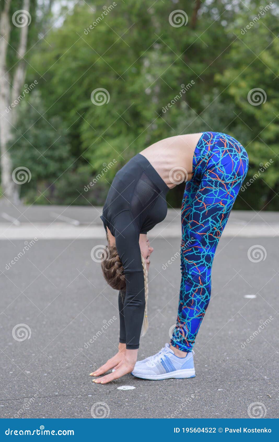 Girl Stretches on the Playground. Stock Photo - Image of outside ...