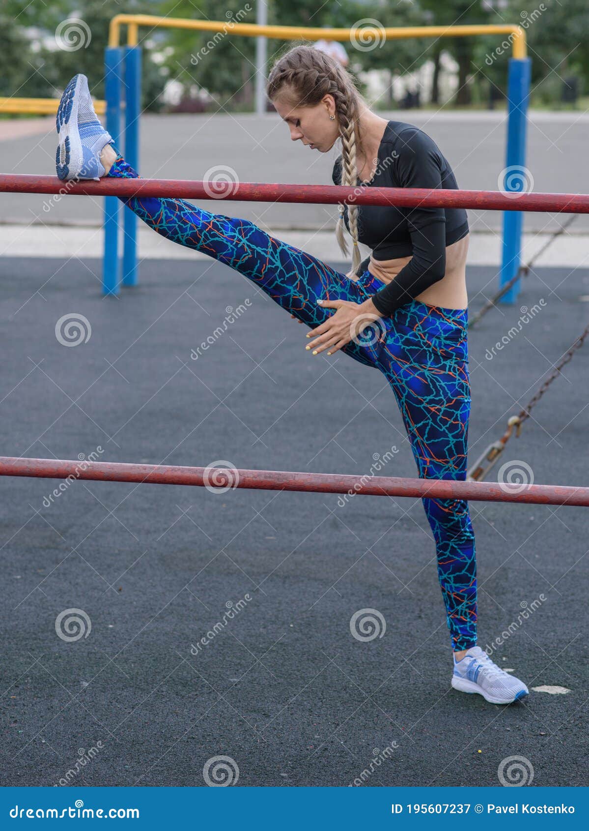 Girl Stretches on the Playground. Stock Image - Image of caucasian ...
