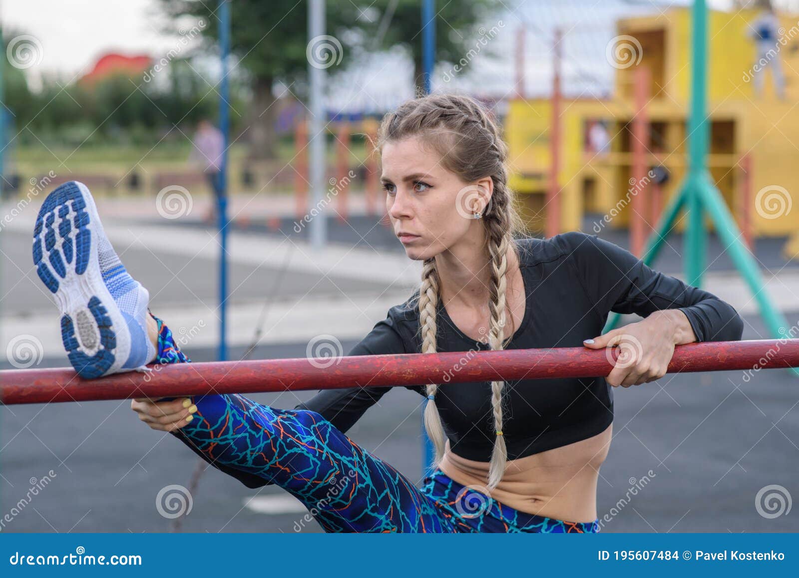 Girl Stretches on the Playground. Stock Photo - Image of jogging, happy ...