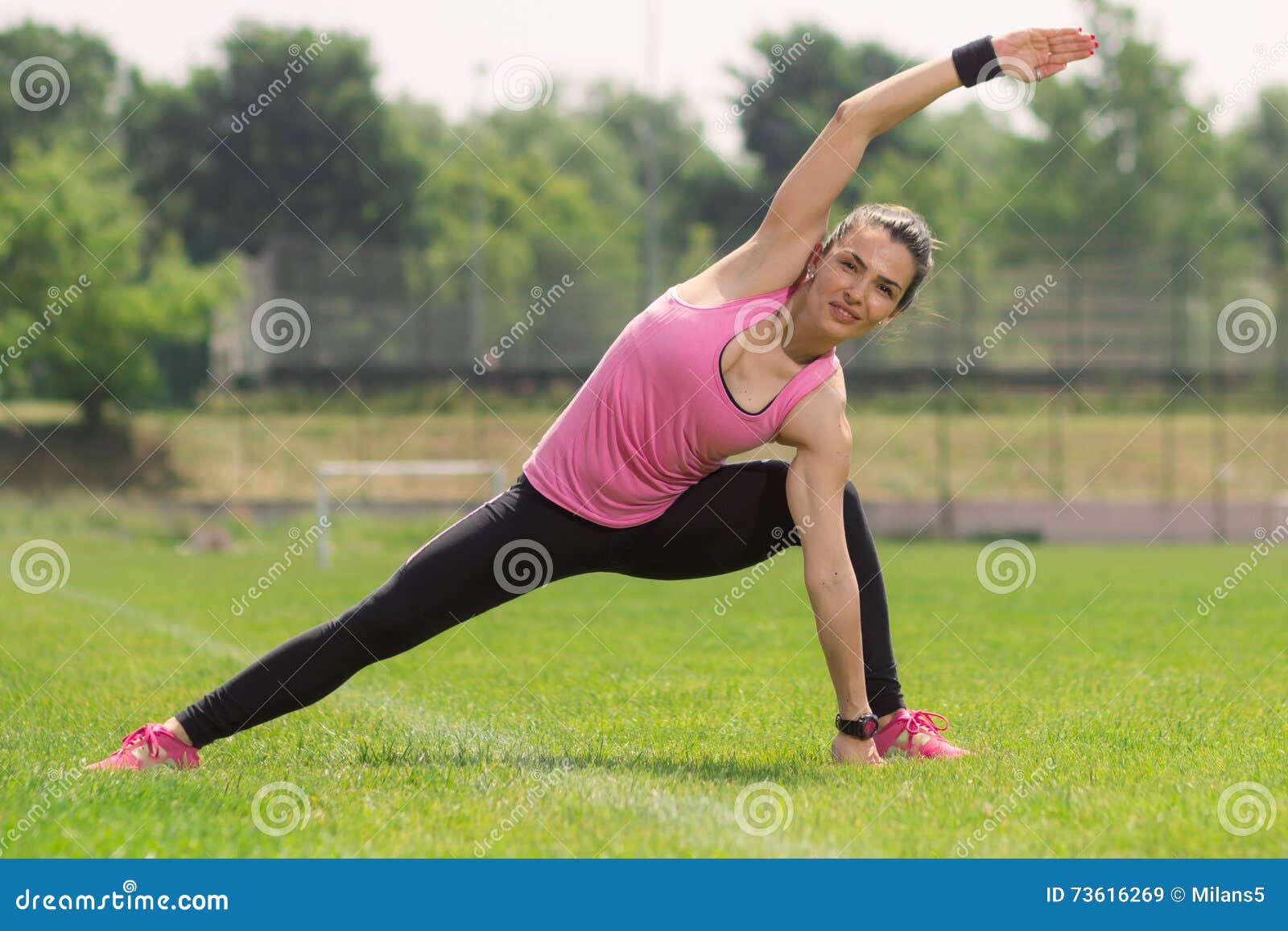 Girl Stretching Arm Leg Extented Stock Image - Image of field, athlete ...
