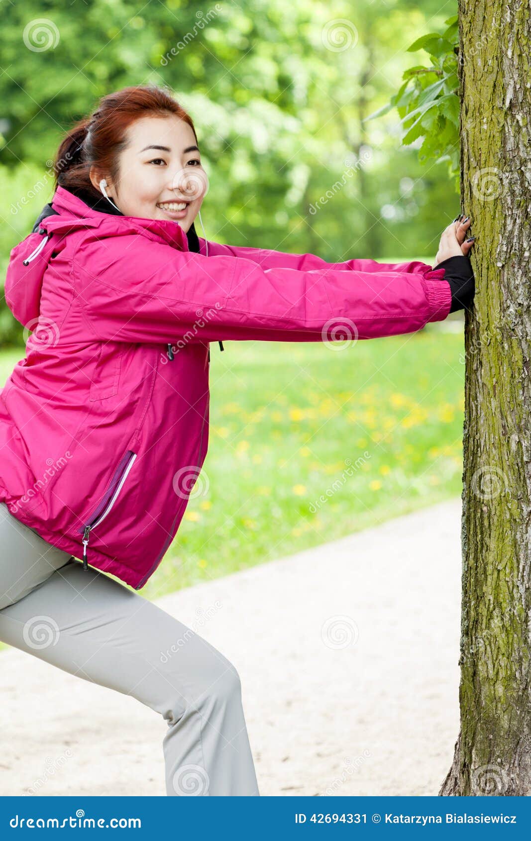 Girl Stretching beside Tree Stock Image - Image of recreation ...