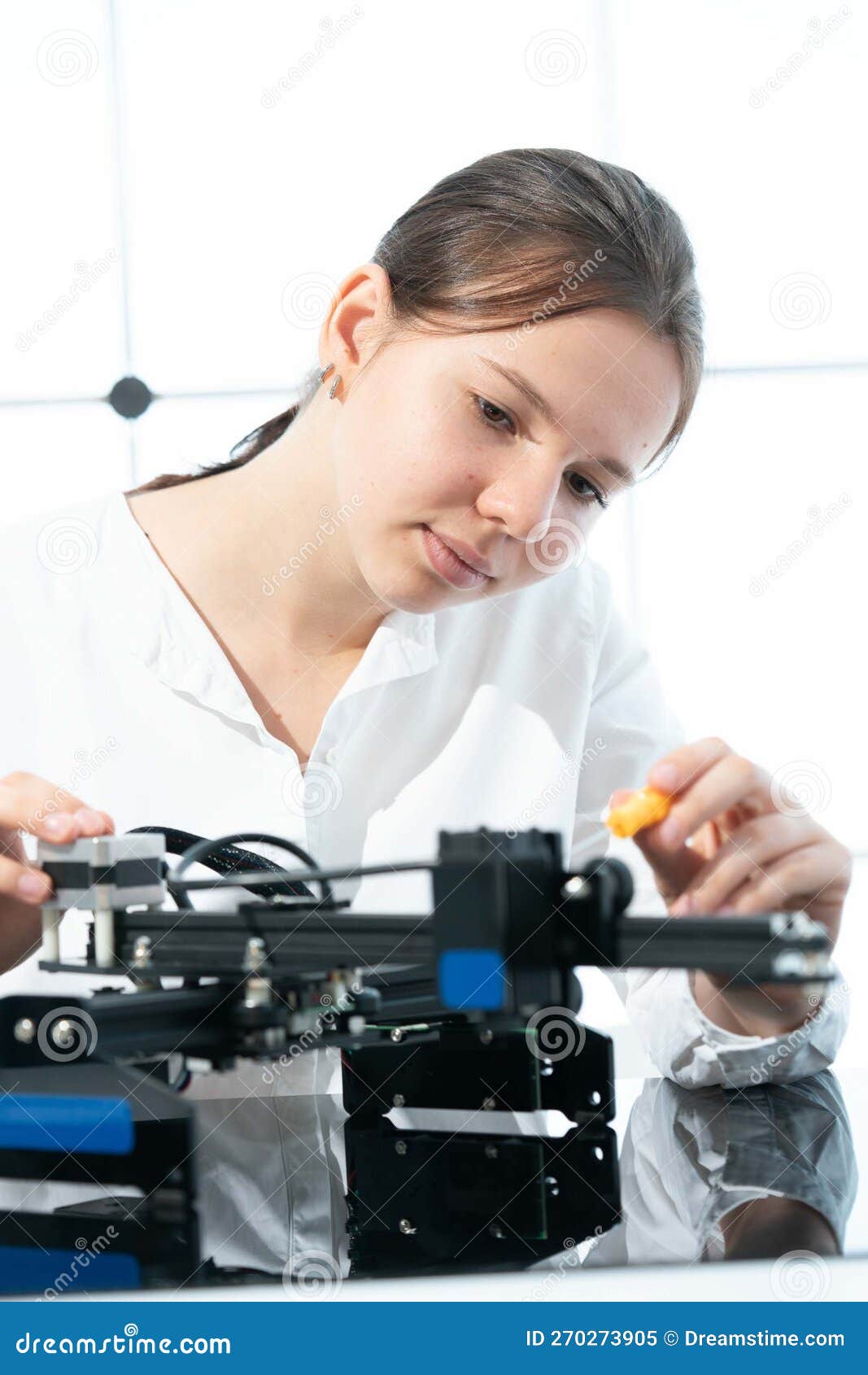 Girl Student Assembling Electronic Devices in the Robotics Laboratory ...