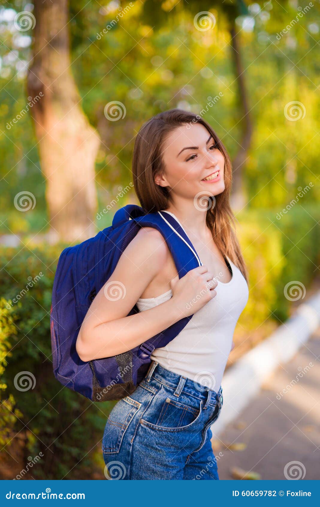 A Girl Student with a Backpack in Park Stock Photo - Image of mixed ...