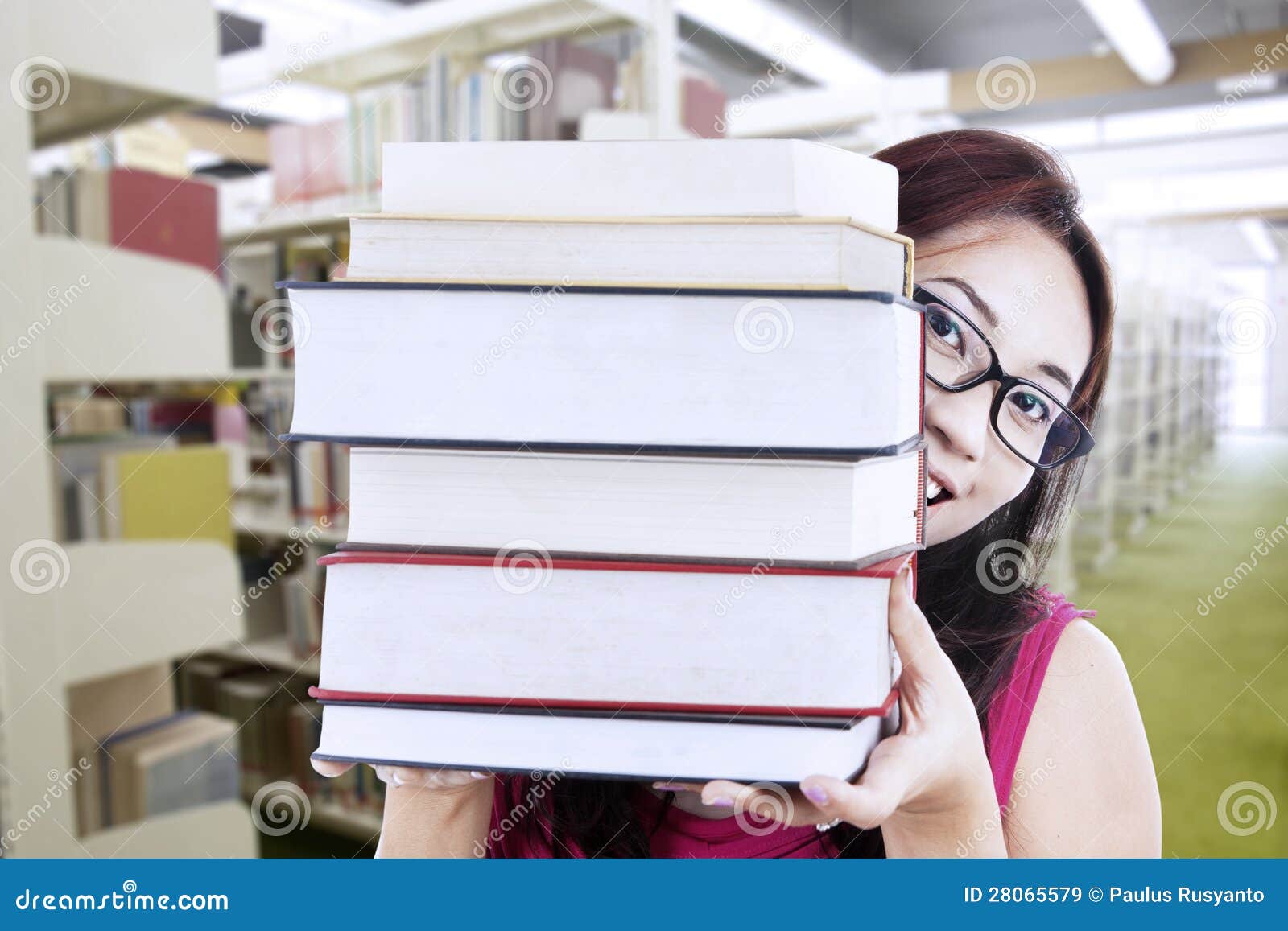 Girl student behind books stock image. Image of attractive - 28065579