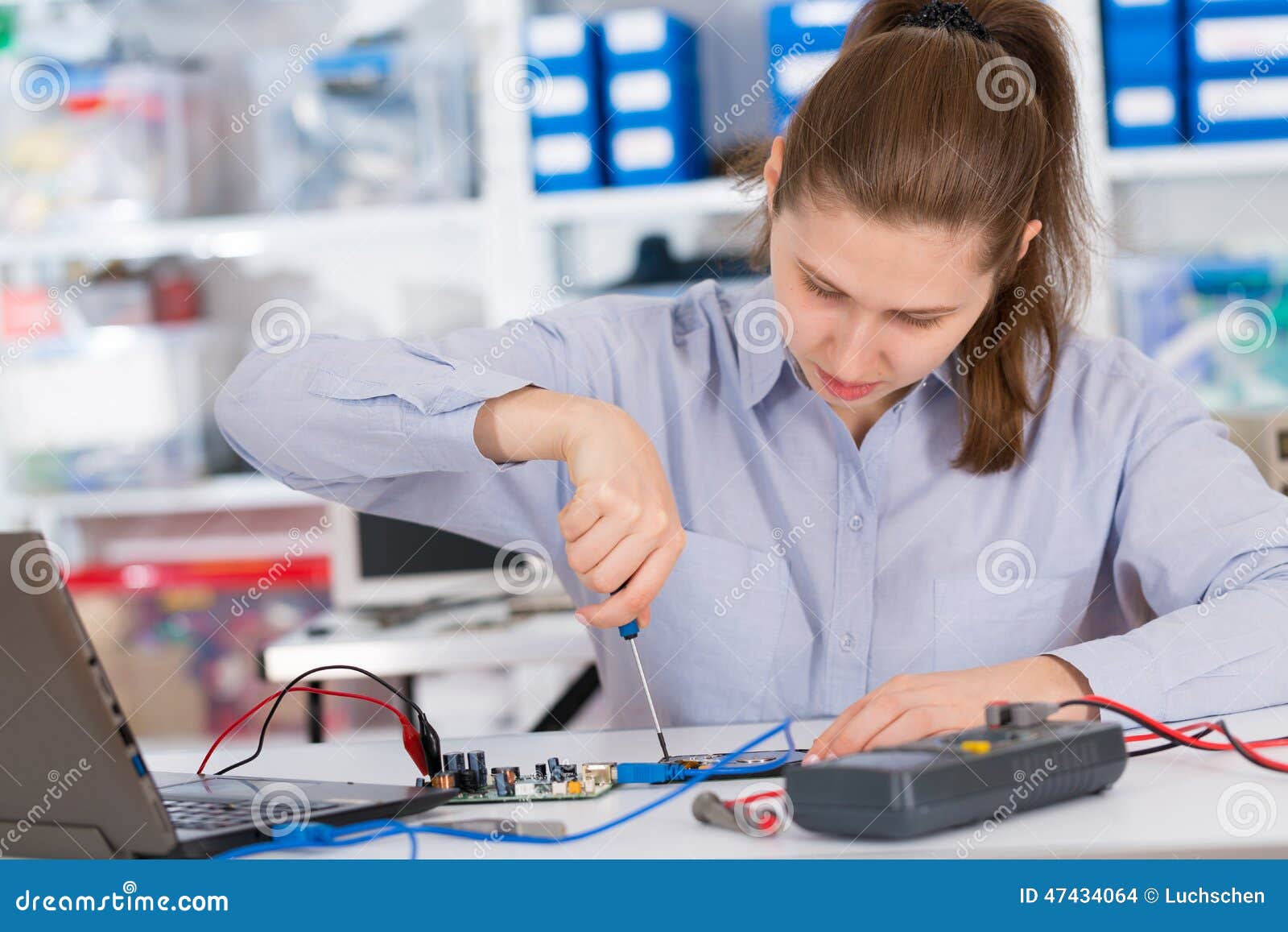 Girl Student Studying Electronic Device with Microprocessor Stock Photo ...