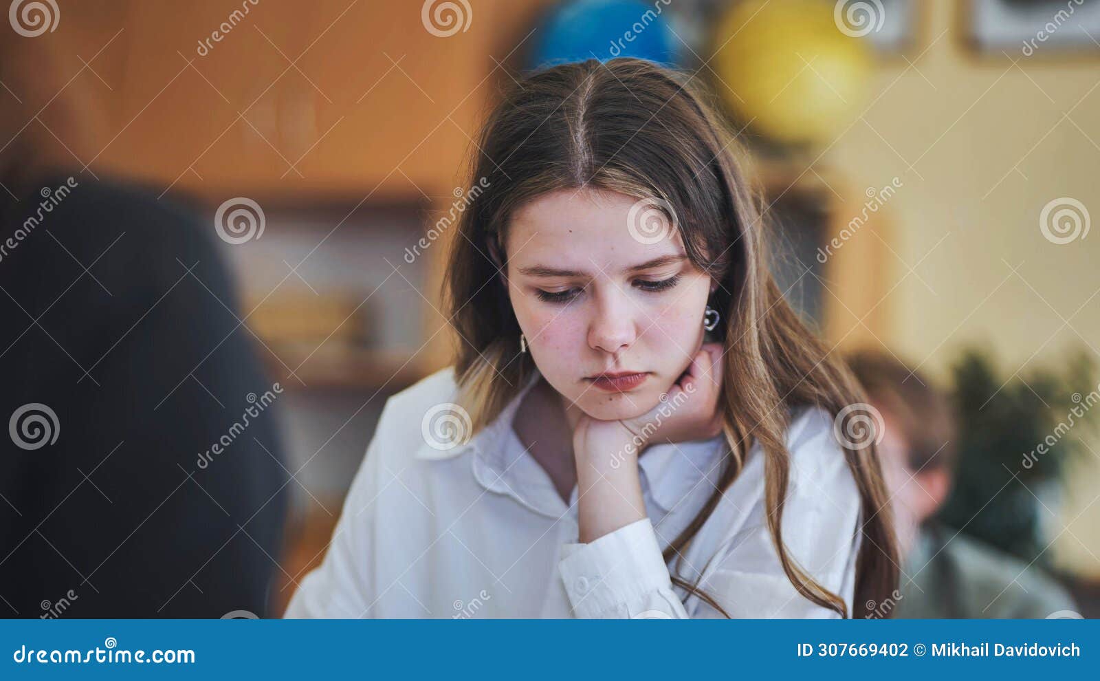 A Girl Student Writes Math Formulas in a Notebook. Stock Photo - Image ...