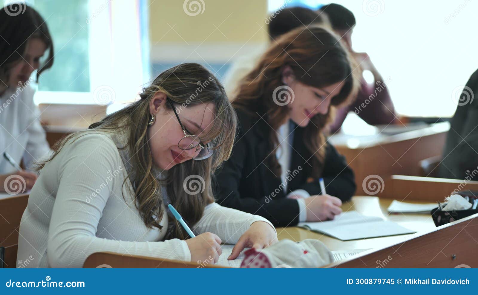 Girl Students Writing Math Formulas in a Notebook. Stock Video - Video ...