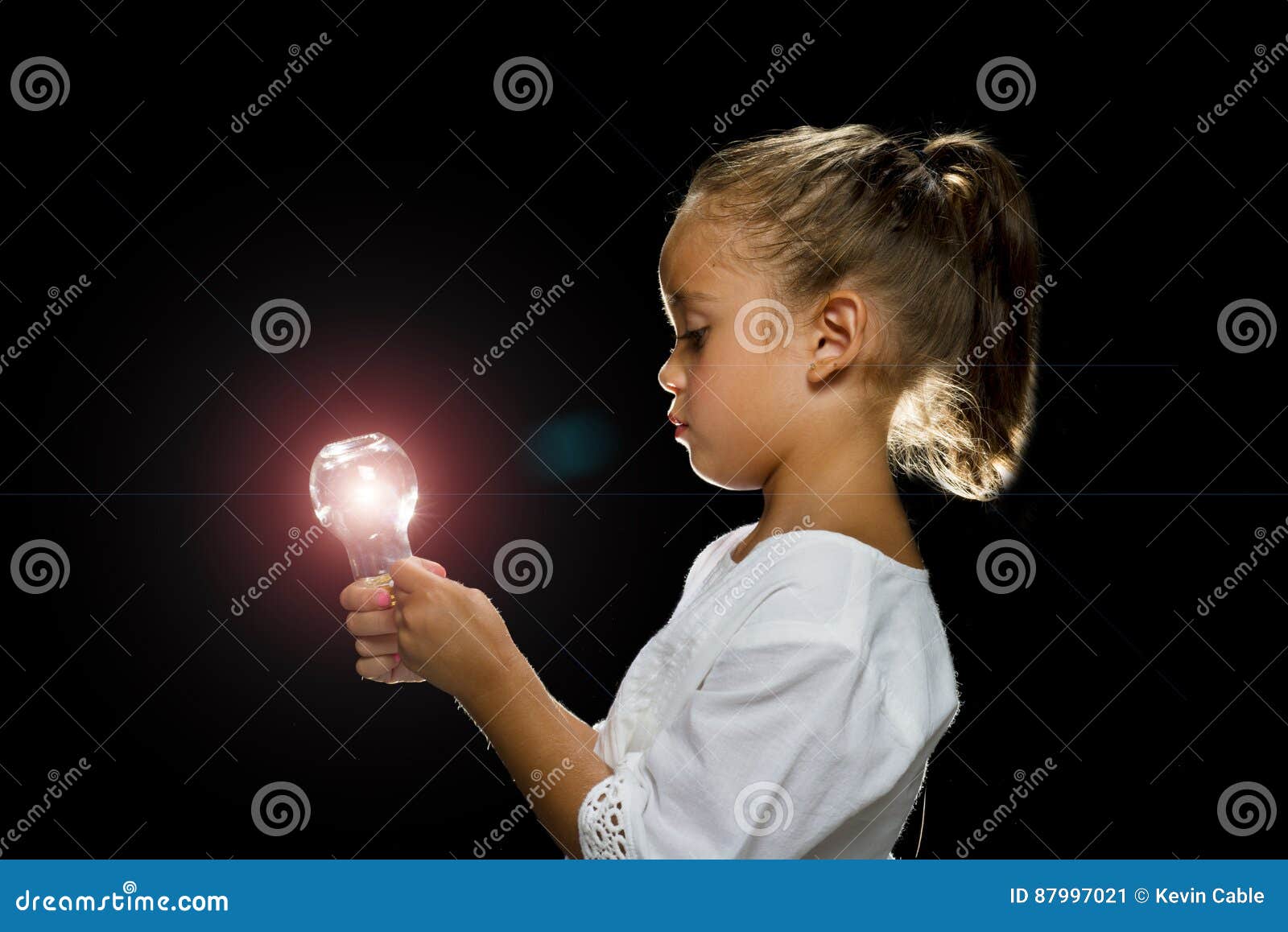 Girl In Studio Holding Lightbulb Stock Image - Image of looking ... Girl In Studio Holding Lightbulb Stock Image - Image of looking ...
