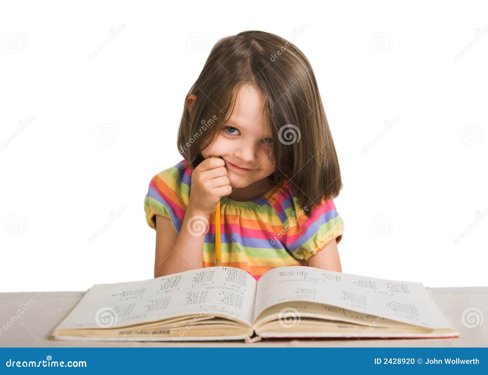 Girl studying from book stock photo. Image of look, educate - 2428920