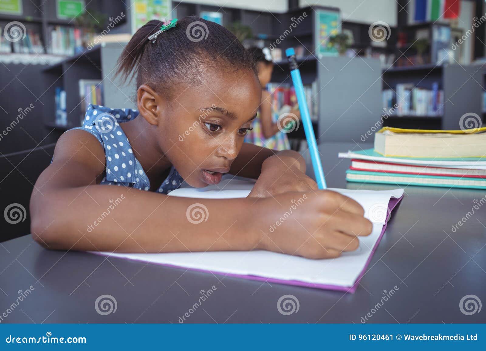 Girl Studying at Desk in Library Stock Image - Image of concentrating ...