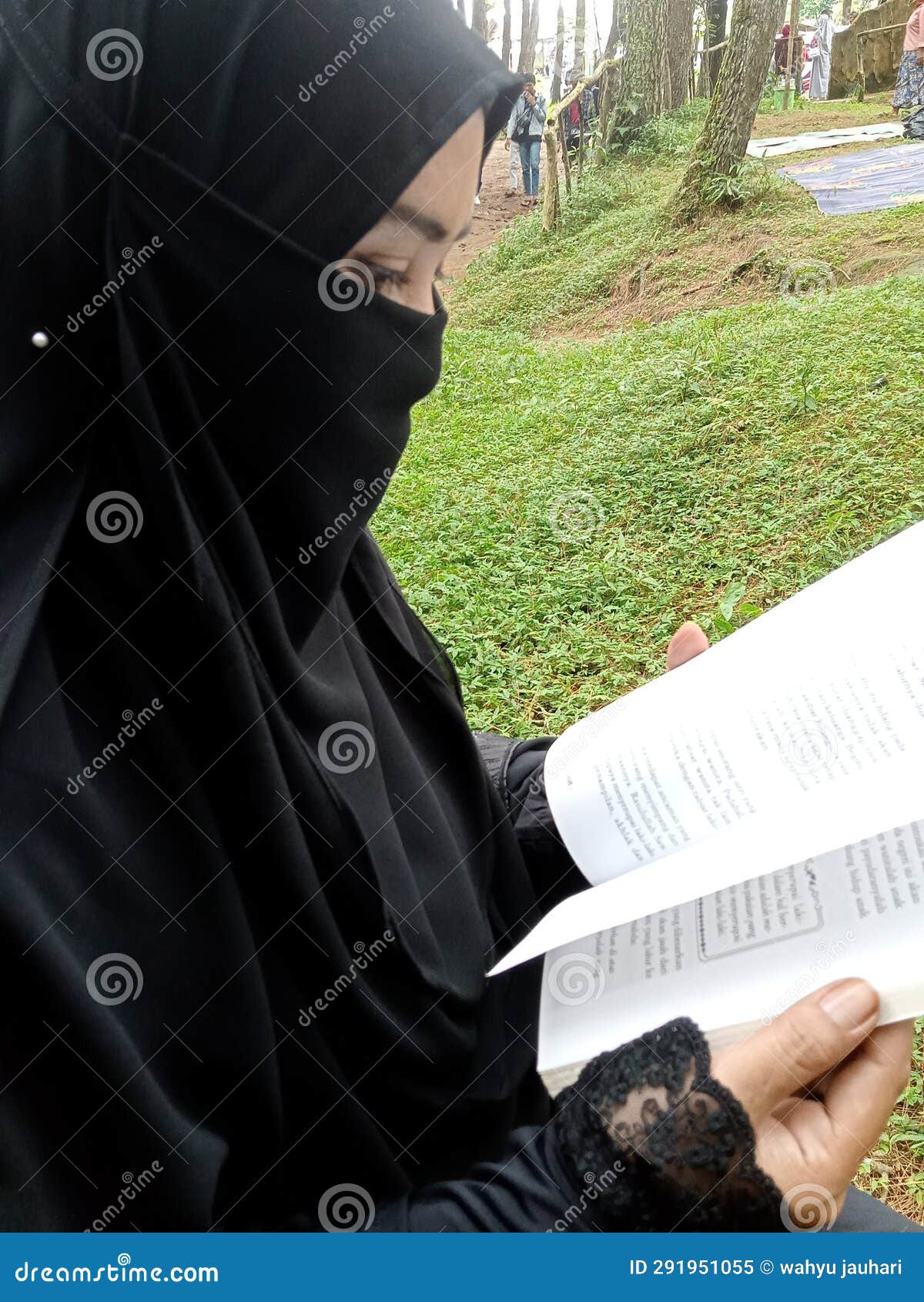 A girl studying in nature stock image. Image of nature - 291951055