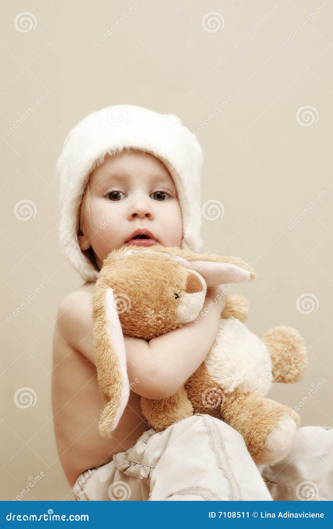 Girl with stuffed rabbit stock image. Image of hold, hugging - 7108511