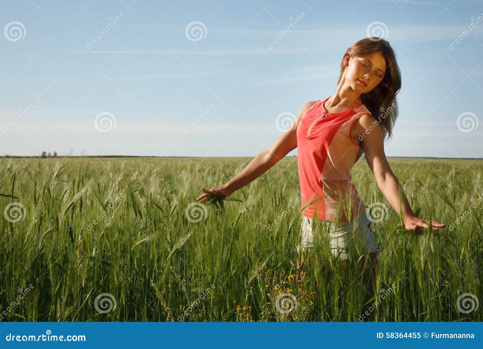 Girl on the summer field stock image. Image of adult - 58364455