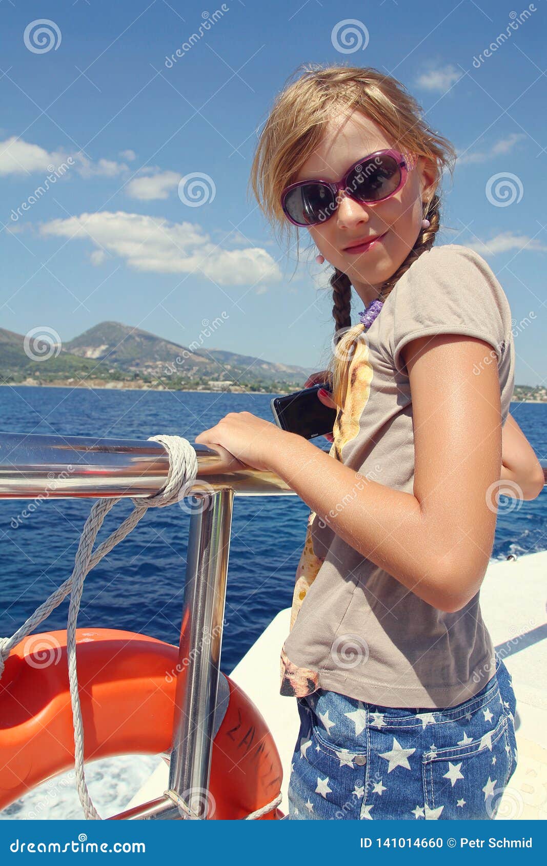 Girl in sunglasses on boat stock photo. Image of waves - 141014660