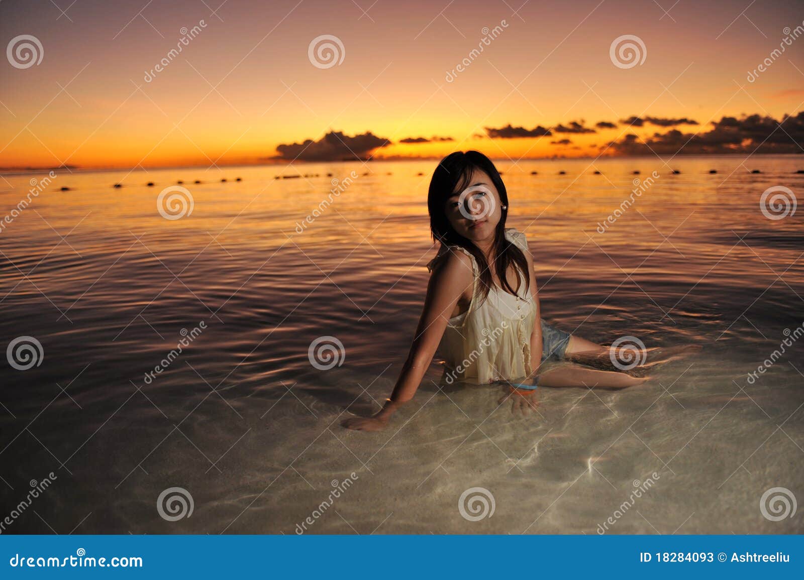Girl in sunset stock image. Image of bright, beach, sunny - 18284093