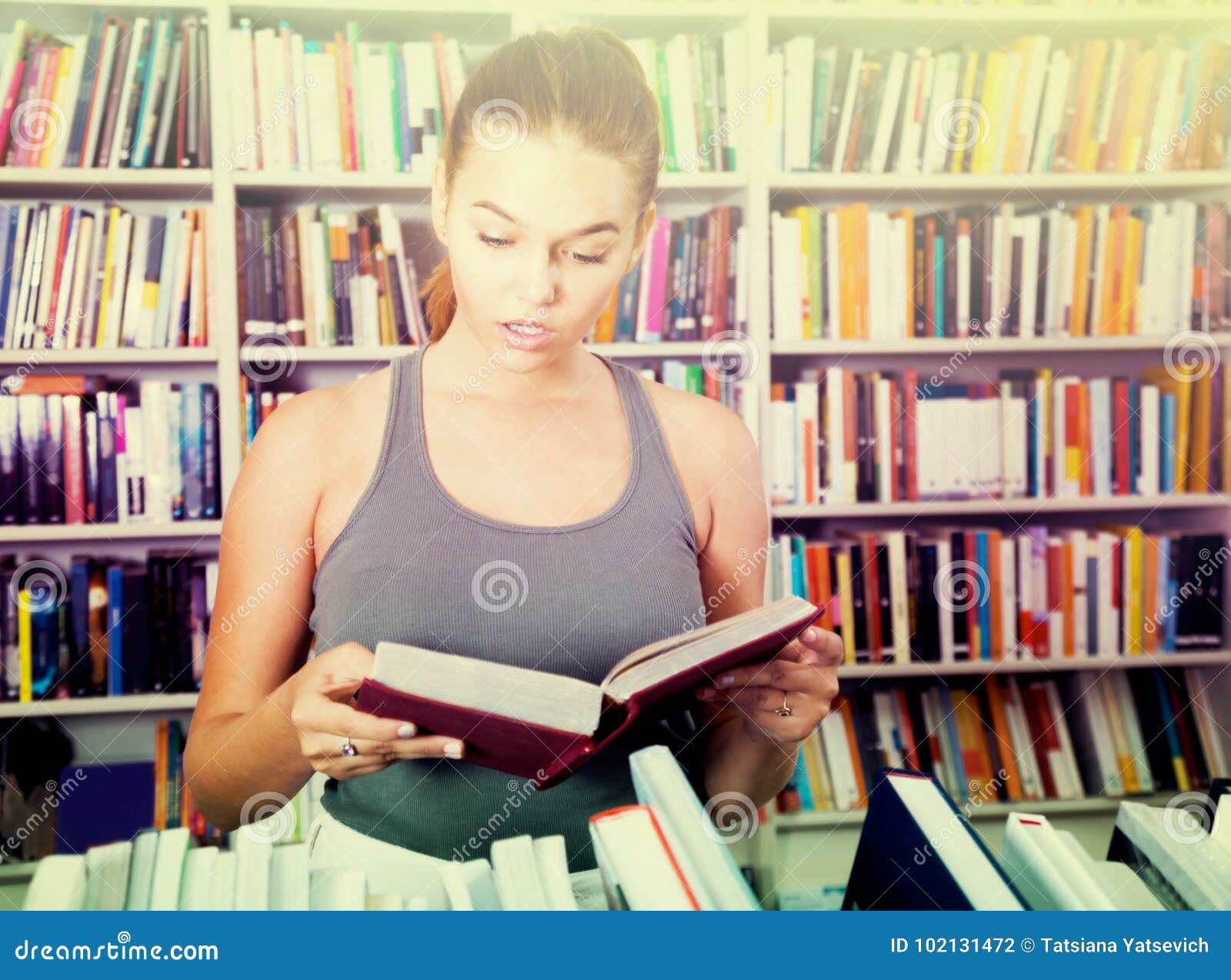 Girl Surprised Book in the Library Stock Photo - Image of schoolgirl ...