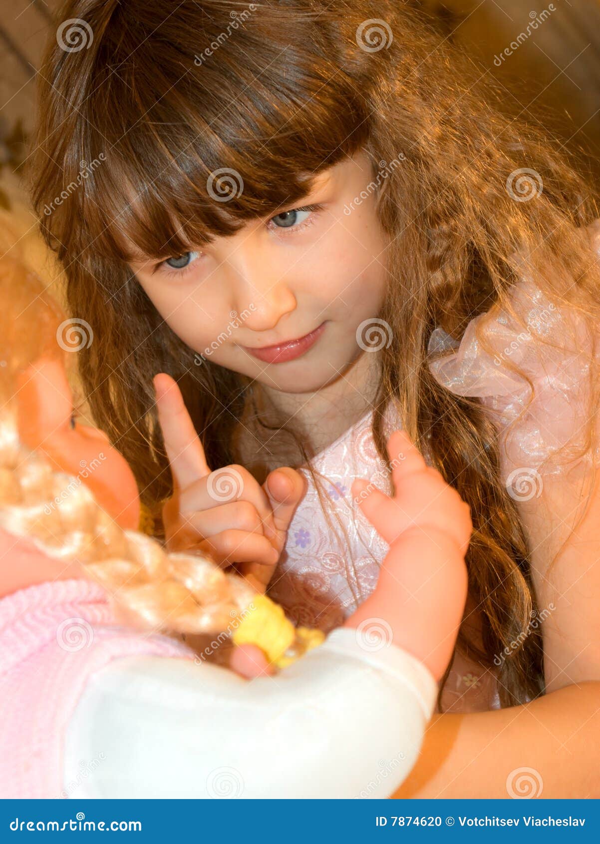 A girl swears at a doll stock photo. Image of punishment - 7874620