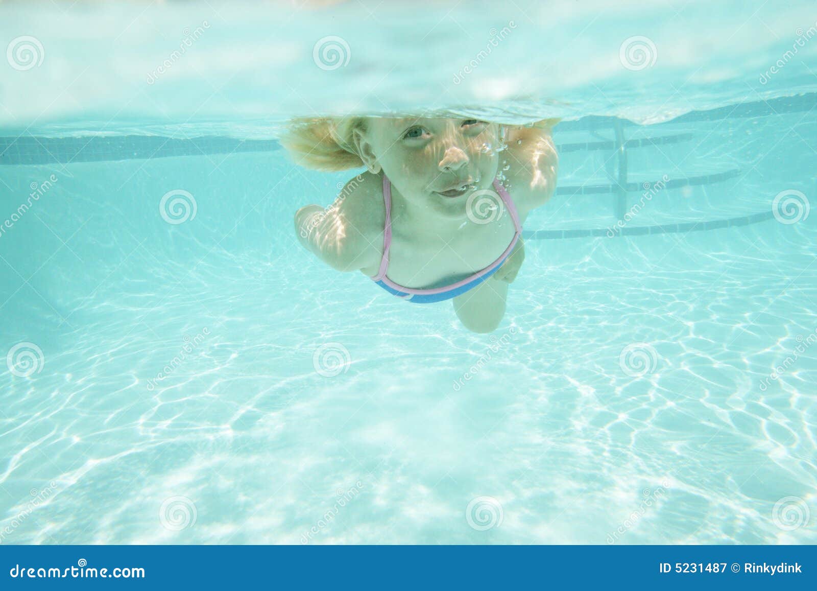 Girl swimming underwater stock image. Image of vacation - 5231487