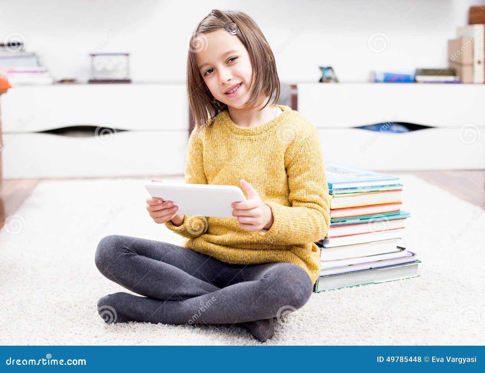 Girl with tablet stock photo. Image of home, holding - 49785448