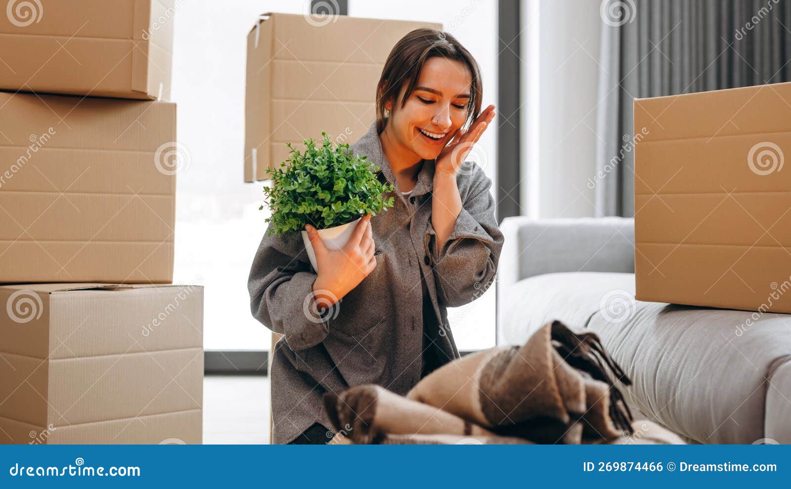 The Girl Takes Things Out of the Box from Which the Light Shines Stock ...