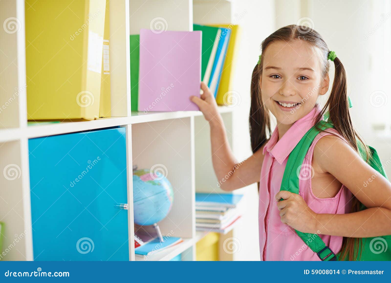 Girl taking book stock photo. Image of backpack, cute - 59008014
