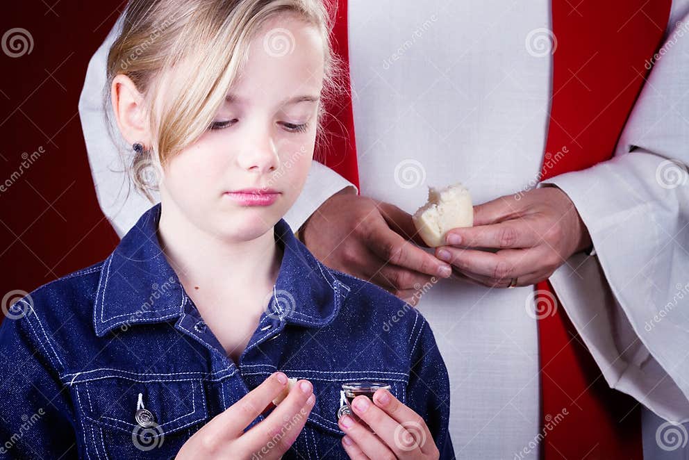 Girl taking Communion stock image. Image of faith, christian - 21841095
