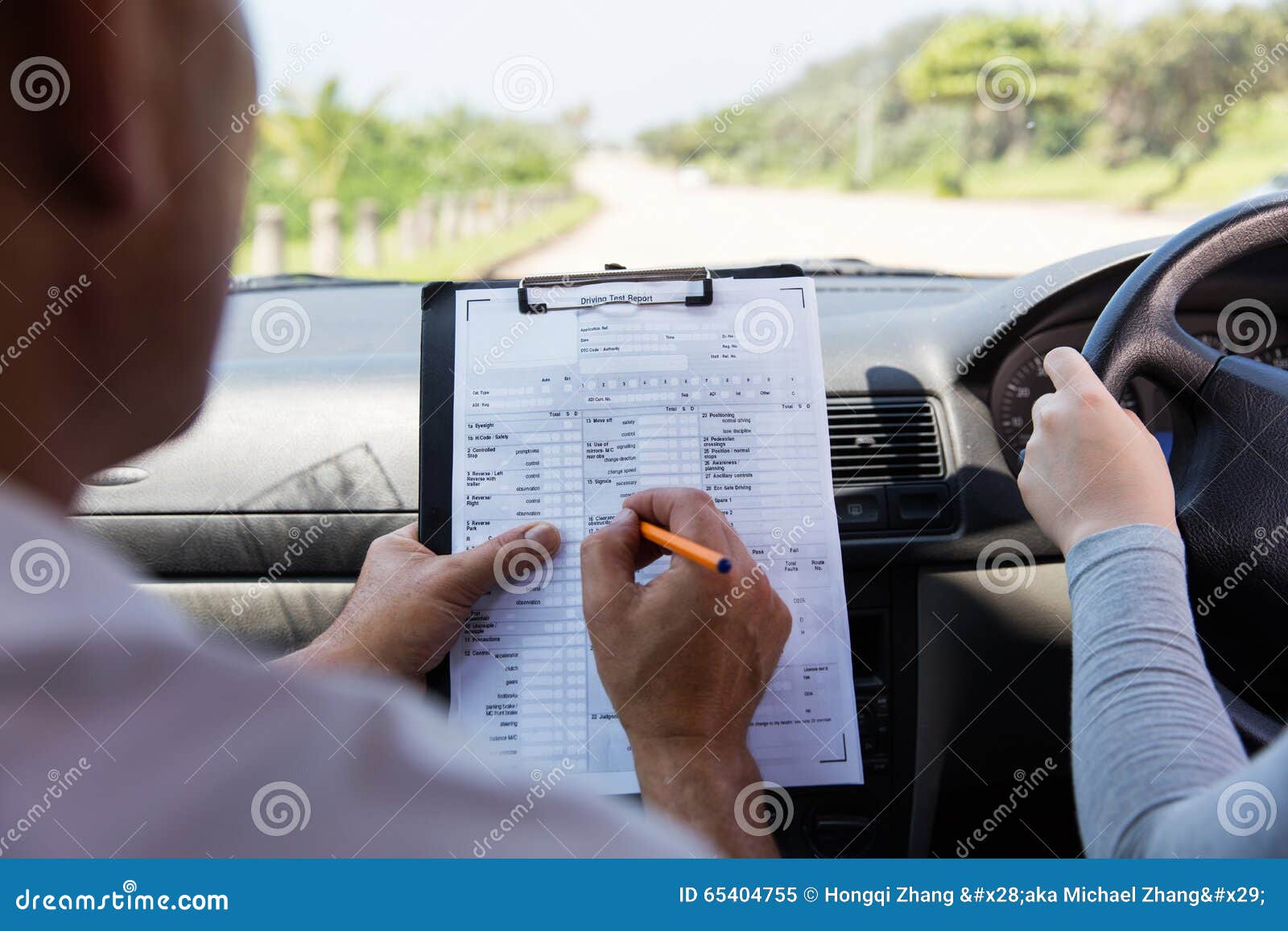 Girl taking driving test stock image. Image of motor - 65404755
