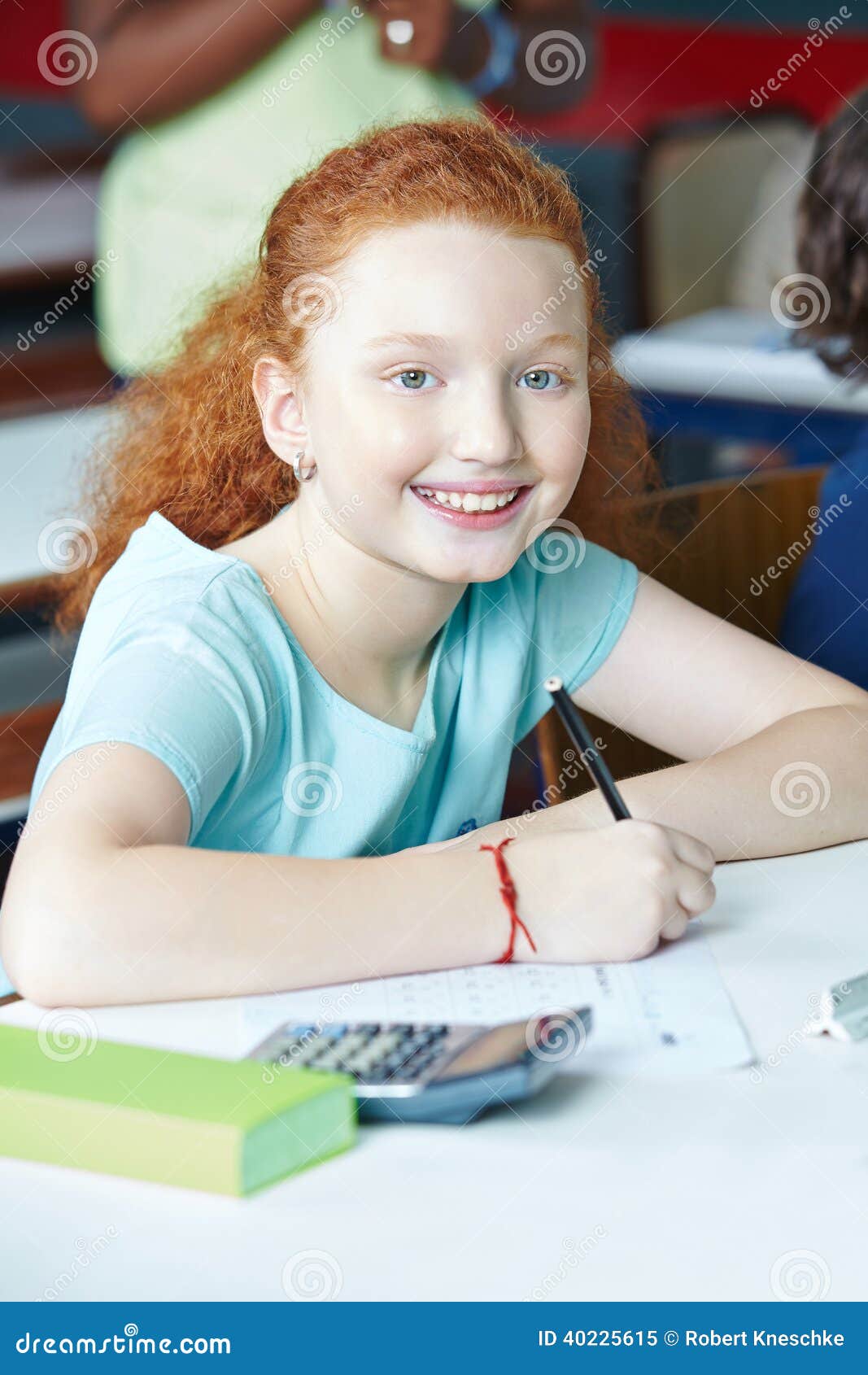Girl taking notes in class stock image. Image of classroom - 40225615