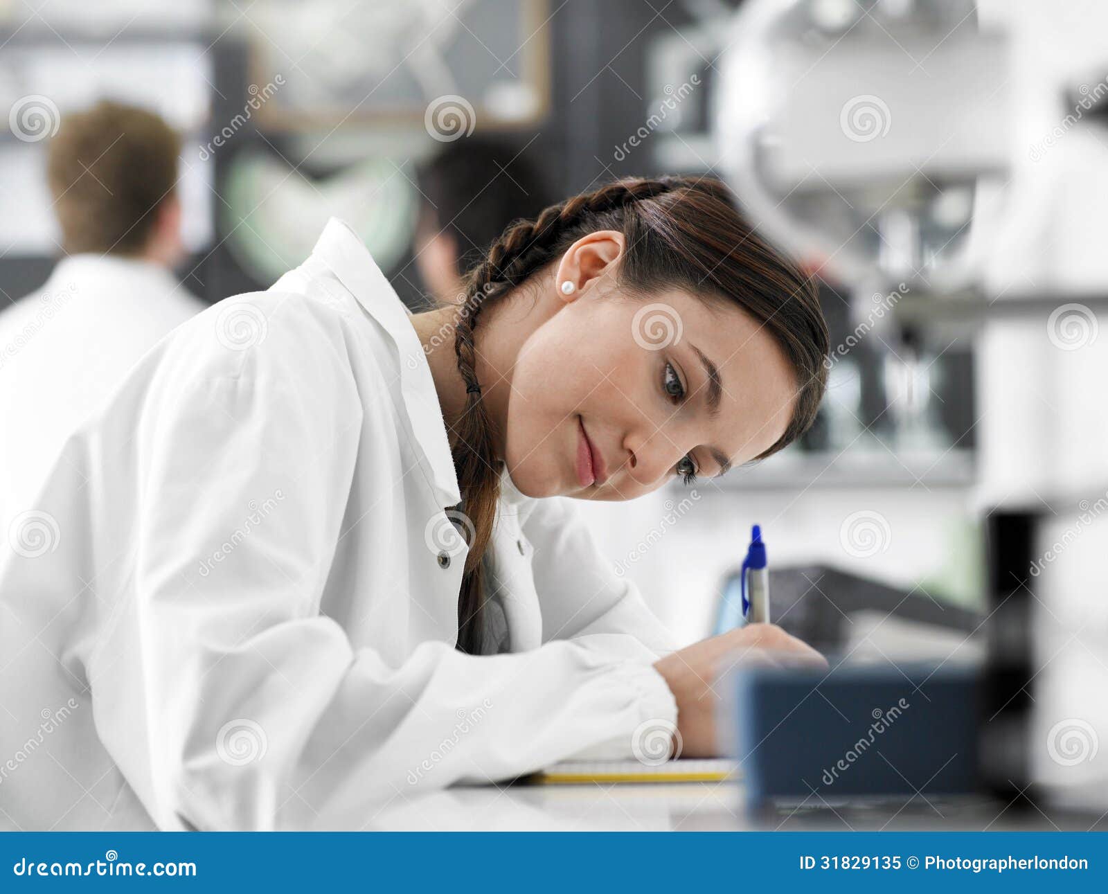 Girl Taking Notes in Science Class Stock Image - Image of education ...